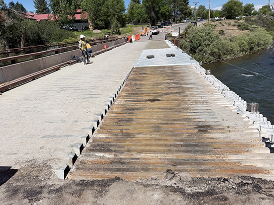 Crews have replaced half of the south side decking on the County Road ...